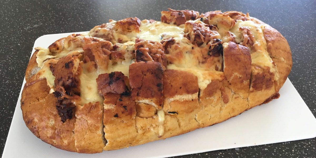 A recipe and instructions for making sun dried tomato and basil cheesy ...
